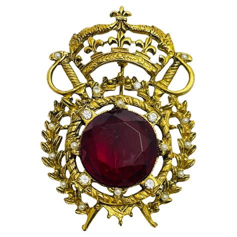 Vintage Gold Swords Crown Shield Ruby Glass Designer Brooch For Sale At