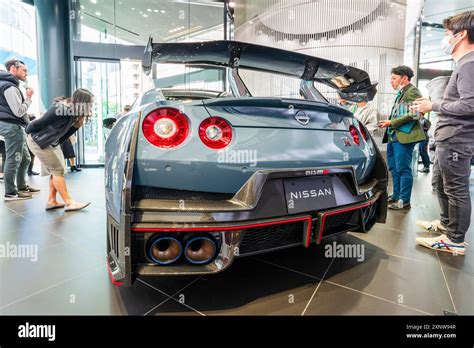 A Gt R Nismo Car On Display In The Nissan Showroom At The Ginza Place Building Low Angle Rear
