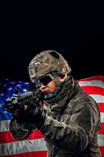 Premium Photo Photo Of Soldier Holding The Usa Flag In Background