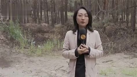 探访乌克兰伊久姆“乱葬岗”：仅少数十字架写有死者信息凤凰网视频凤凰网