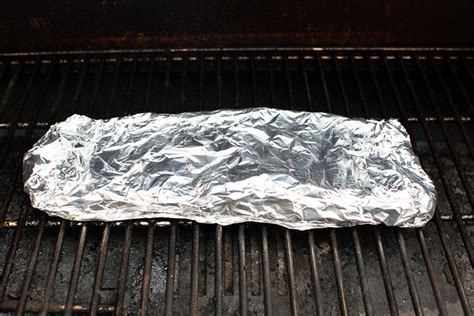 Foil Wrapped Pork Rib In The Smoker