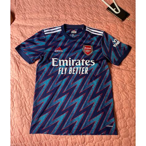 เสื้อบอลarsenalชุดแข่งขันชุดที่3ประจำฤดูกาล2021 22 Shopee Thailand