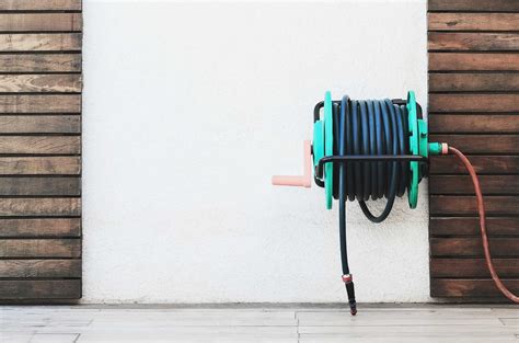 How To Install A Hose Reel On The Side Of A House