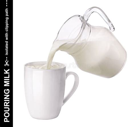 Pouring Milk From Jug Into Glass Isolated On White Background Stock