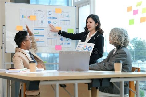 Business Team Analyzing Income Charts And Graphs Financial Analysis