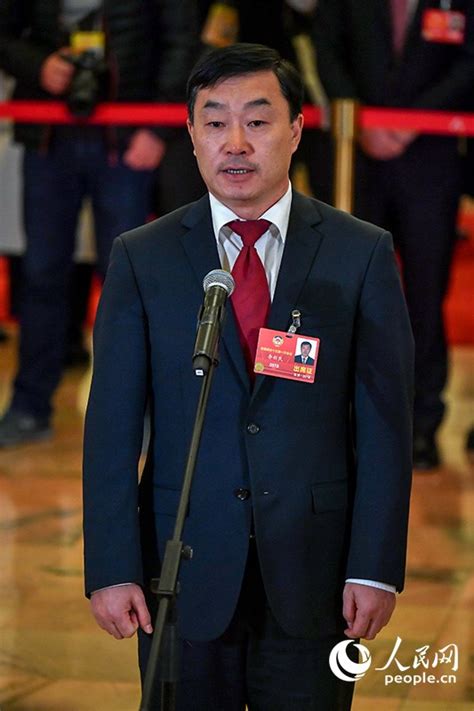 李新民委员用铁人精神打造响亮中国名片