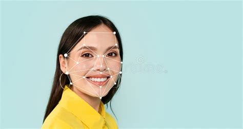A Woman Smiles While A Facial Recognition Technology Overlay Maps Her Features Stock