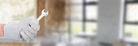 Transitioning Windows On Building Site A Hand Holding A Spanner Photo Background And Picture For