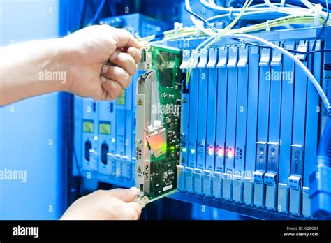 People Fix Core Switch In Network Room Stock Photo Alamy