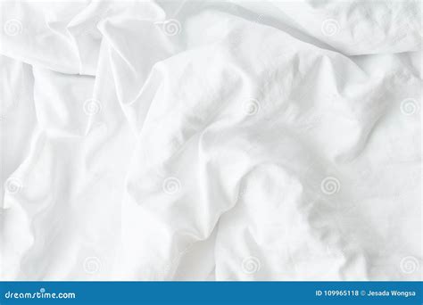 White Wrinkled Fabic Textureclose Up Unmade Bed Sheet In The Bedroom
