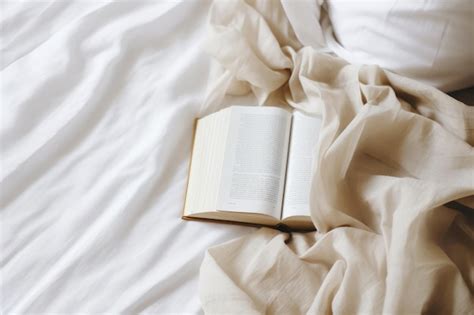 Premium Photo The Divine Symbolism Exploring A Bible On A White Textile