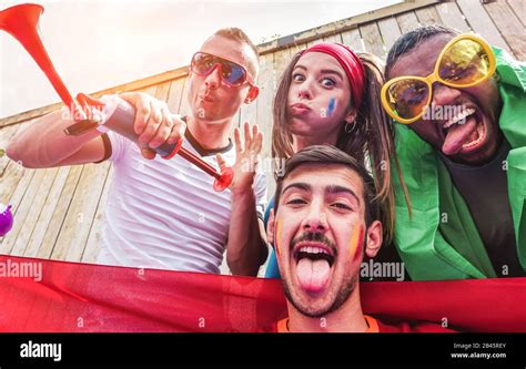 Happy Sport Supporters Having Fun During Football World Game Young
