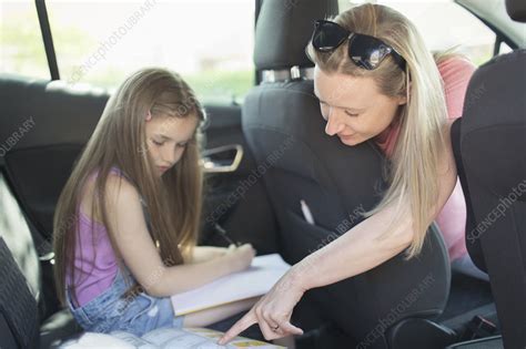 Mother Helping Daughter Doing Homework Stock Image F0227373