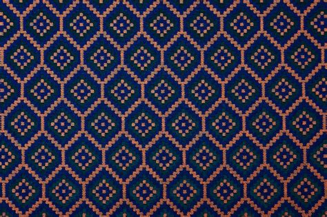 Premium Photo A Blue And Orange Fabric With A Geometric Design