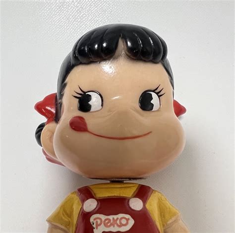 Yahooオークション 不二家 ペコちゃん 首振り人形 ゼンマイ歩行