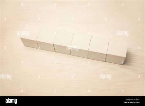 Row Of Blocks On Table Stock Photo Alamy
