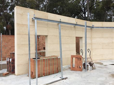 Motus Architecture News Completed Rammed Limestone Wall At Bedfordale