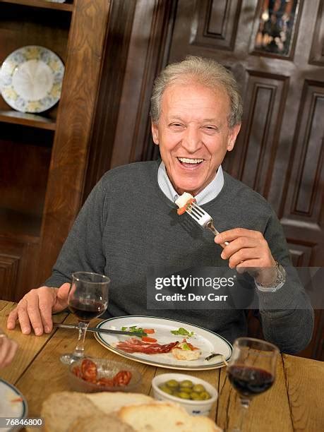 People Eating Olives Photos And Premium High Res Pictures Getty Images