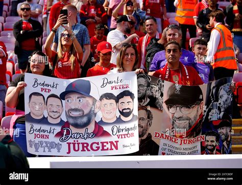 Liverpool Fans Hold Up Signs For Jurgen Klopp Ahead Of The Premier