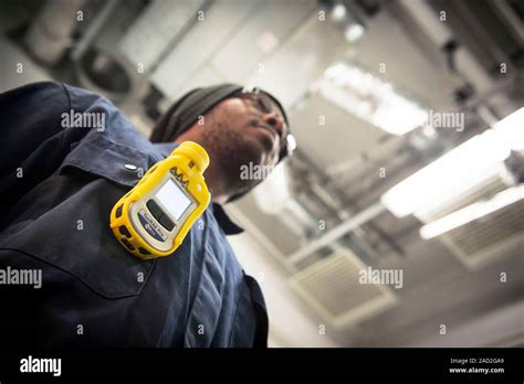 Portable Gas Detector Industrial Worker Wearing A Portable Gas