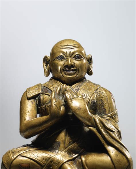 Bonhams A Silver And Copper Inlaid Brass Alloy Figure Of A Lama Tibet
