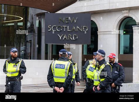 Police Officers Outside New Scotland Yard On A Busy Day Of Protests In