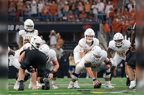 Texas Longhorns And Washington Huskies Vie For College Football