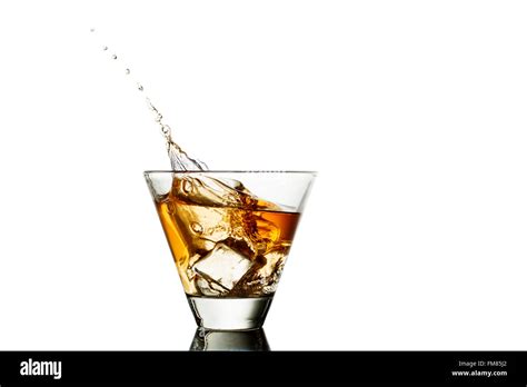 Whisky Splash In Glass Isolated On A White Background Stock Photo Alamy
