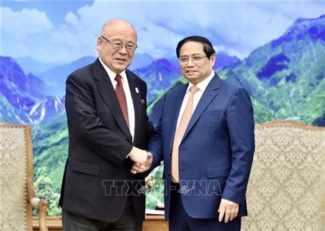 越南政府总理范明正会见日越友好议员联盟特别顾问武部勤