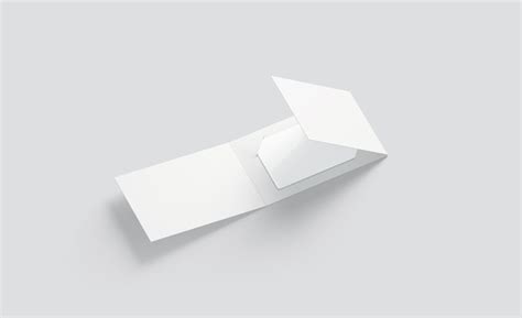 Premium Photo White Plastic Card Mockup Inside Opened Paper Booklet