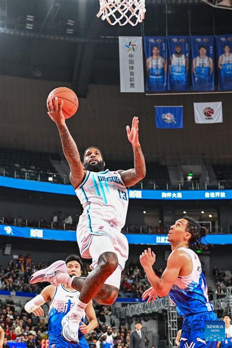 CBA League Xinjiang Flying Tigers Vs Qingdao Eagles Xinhua