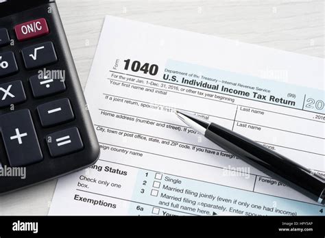Tax Return Blank Calculator And Pen Stock Photo Alamy
