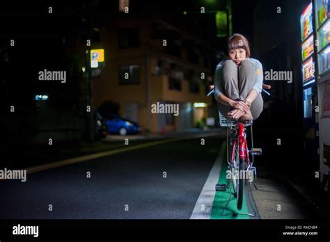 Asian Female Model Poses For Pictures On The Street Stock Photo Alamy
