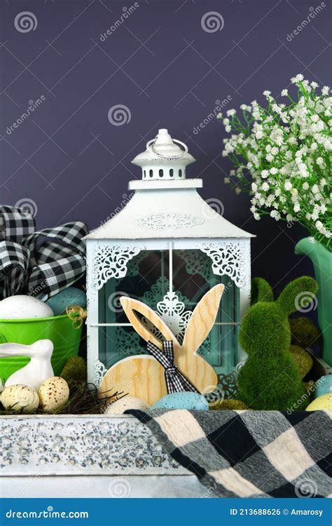 Easter Farmhouse Vignette With Bunnies Easter Eggs And Buffalo Plaid
