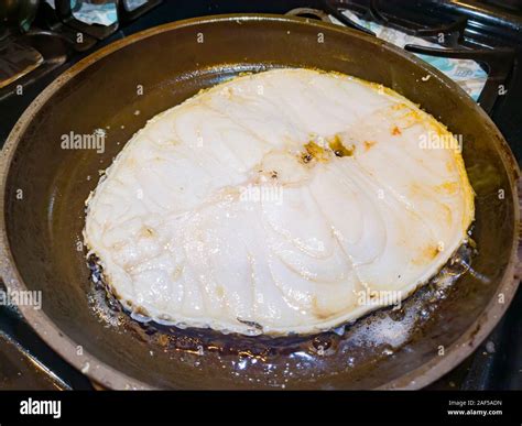 Frying A Big Patagonian Toothfish Steak In A Pan At Las Vegas Nevada