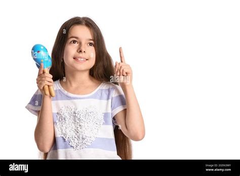 Cute Mexican Girl With Maracas Showing Something On White Background