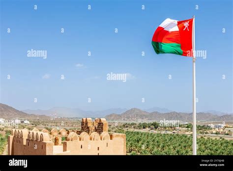 Omani Flag Waving In The Wind View From Jabrin Castle Walls Bahla