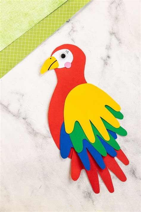 Handprint Parrot Craft Parrot Craft Crafts Preschool Crafts