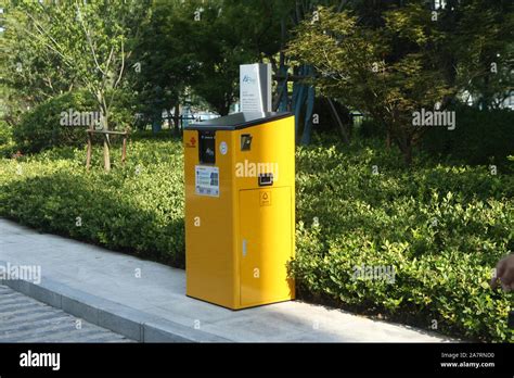 an artificial intelligence ai garbage sorting bin is displayed at