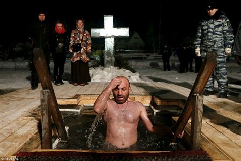 Orthodox Christians Take A Dip In Icy Rivers Across Europe For Epiphany