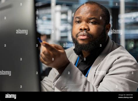 Data Center Computer Scientist Inspecting Gear Doing Maintenance Tasks Server Farm Worker