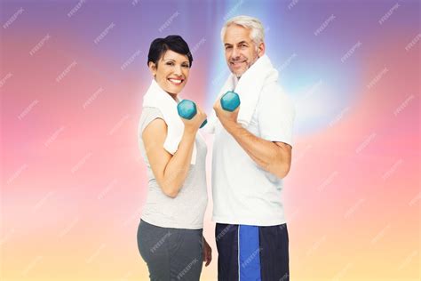 Premium Photo Portrait Of A Fit Mature Couple Exercising With