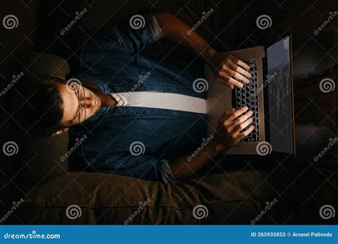 Programmer Laying On Sofa And Working At His Laptop Stock Image Image Of Development