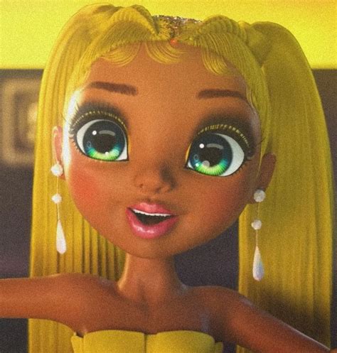 a close up of a doll with big blue eyes and blonde hair wearing yellow ...