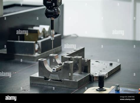 Precision Measurement Cmm Probe Touching Metal Part Ensuring Accuracy And Quality Control In