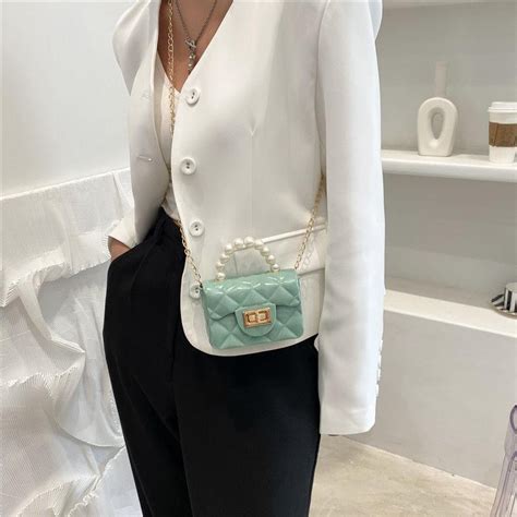 กระเป๋าสะพายไหล่ เนื้อเจลลี่ ขนาดเล็ก แบบพกพา ระดับไฮเอนด์ สไตล์ตะวันตก แฟชั่นสําหรับสตรี 2021