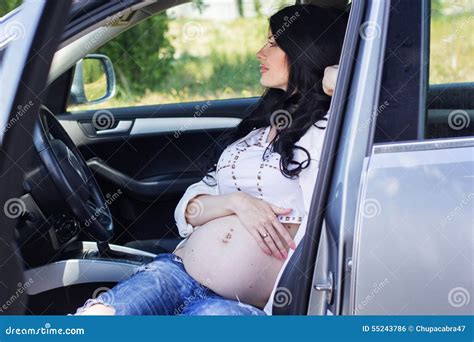 Pregnant Pretty Girl Is Sitting In Car Stock Photo Image Of Luxury Belt