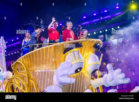 Singapore Prime Minister Lee Hsien Loong In A Float Procession During