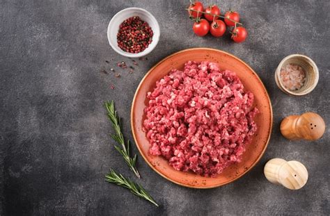 Premium Photo Fresh Raw Mince Minced Beef Ground Meat With Herbs