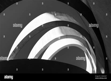 Striking Monochrome Architectural Feature With Sweeping Curves And A Dynamic Interplay Of Light